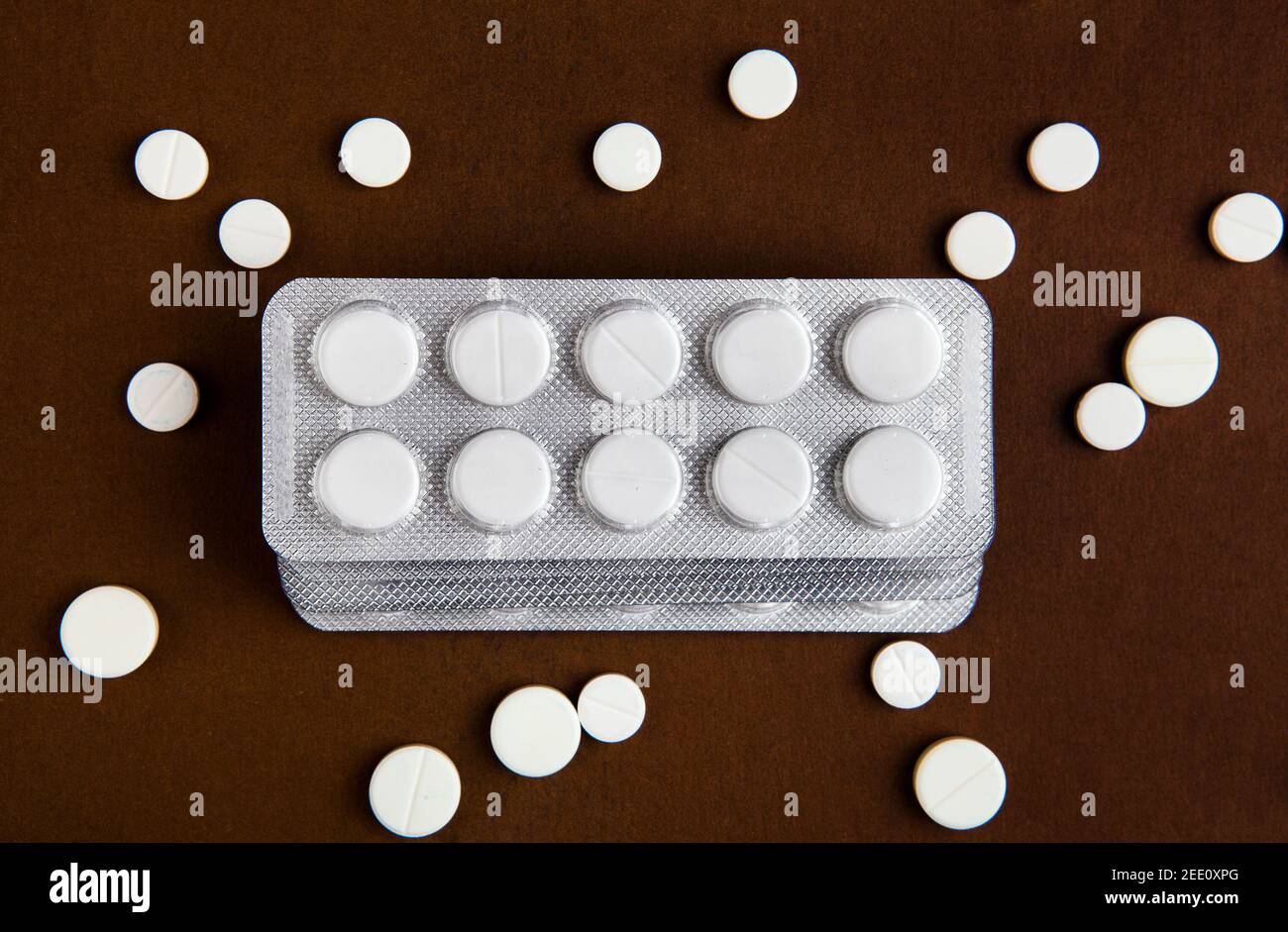 Pills set on brown hi-res stock photography and images - Alamy