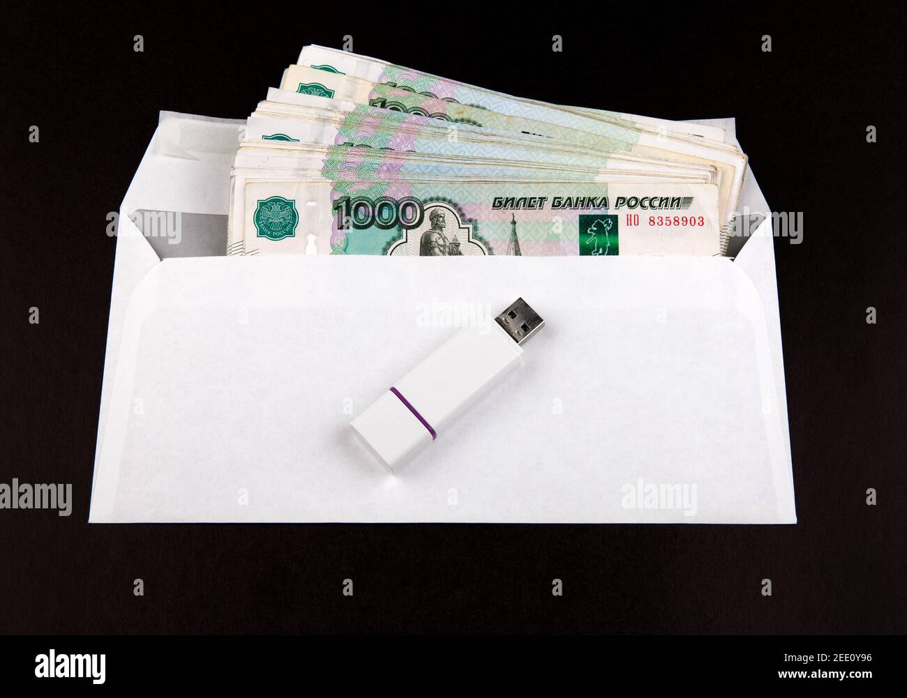 Envelope with a Russian Rubles and USB Drive on the Black Paper ...