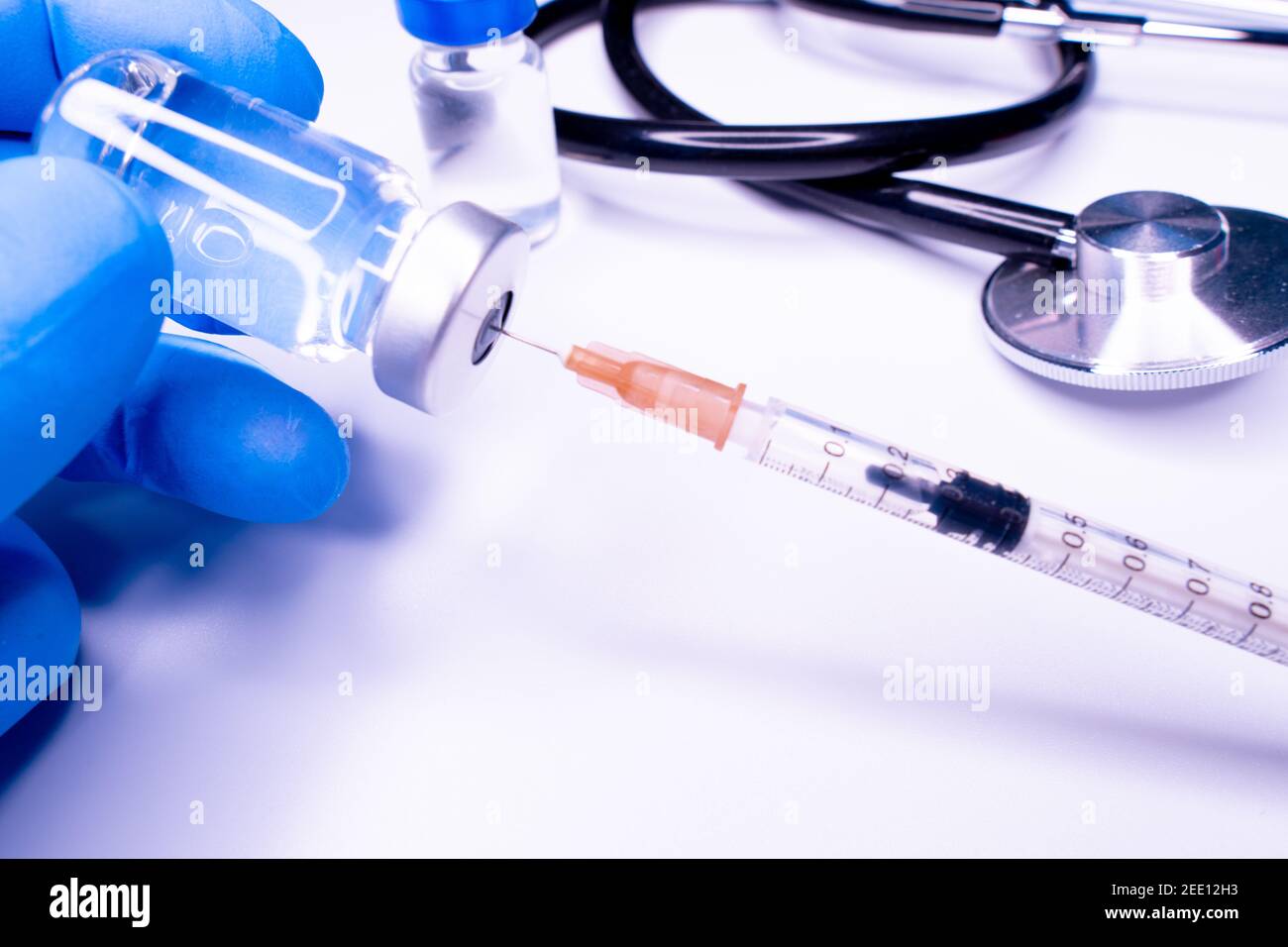 Syringe, medical injection in hand, palm or fingers. Medicine plastic ...