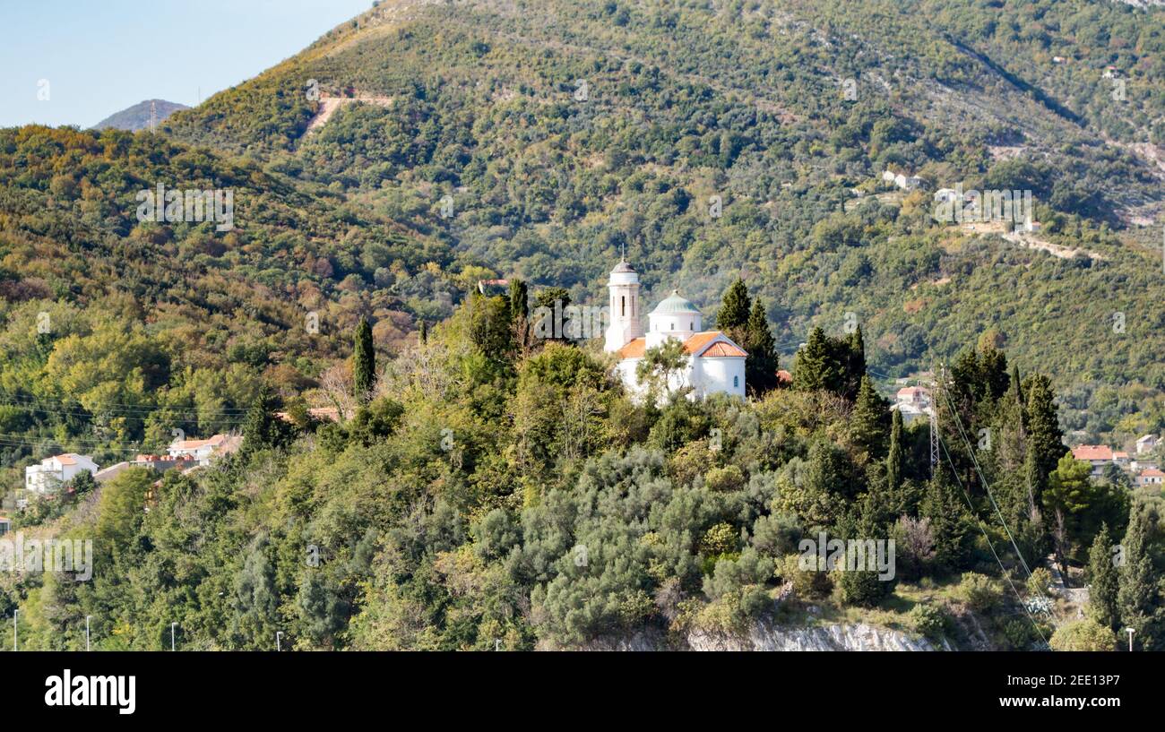 View of Bay of Kotor from the sea surrounded by mountains in Montenegro ...