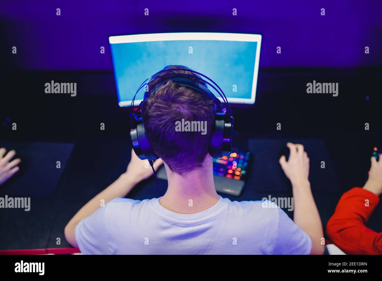Professional gamer playing online games tournaments pc computer with ...