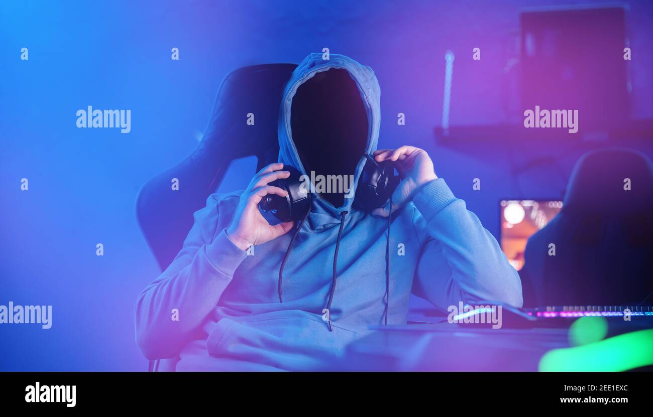 incognito hacker professional cyber gamer playing online computer game ...