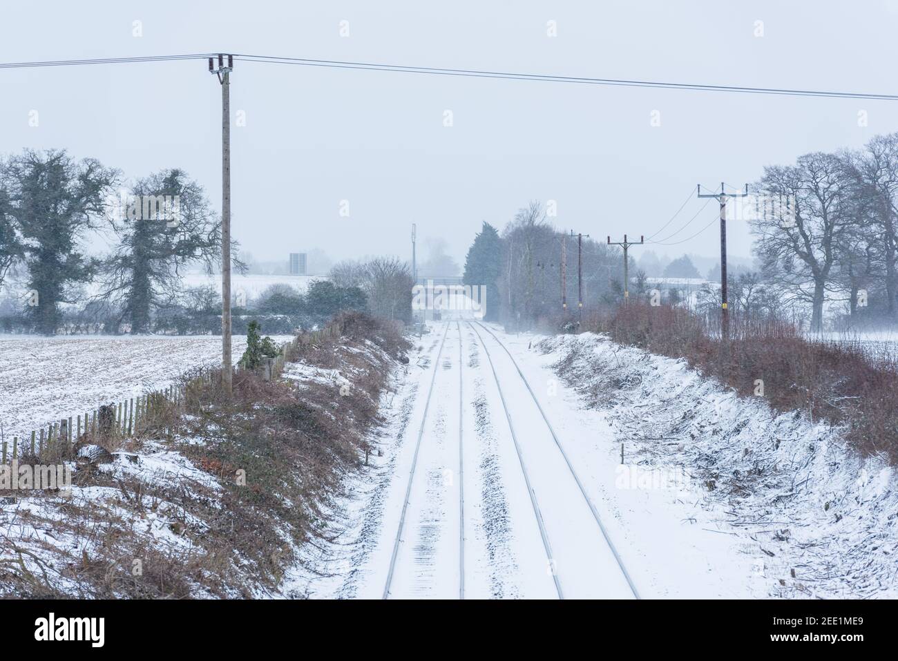 Snow by Middle road railway bridge parapet and 365 identification sign ...