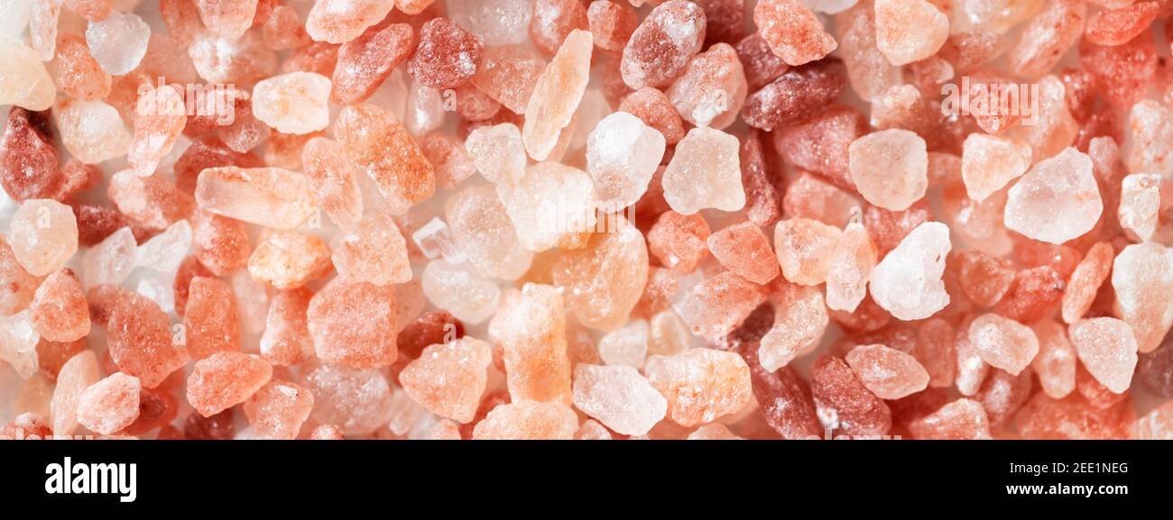 Banner with Himalayan pink crystal salt. Top view Stock Photo - Alamy
