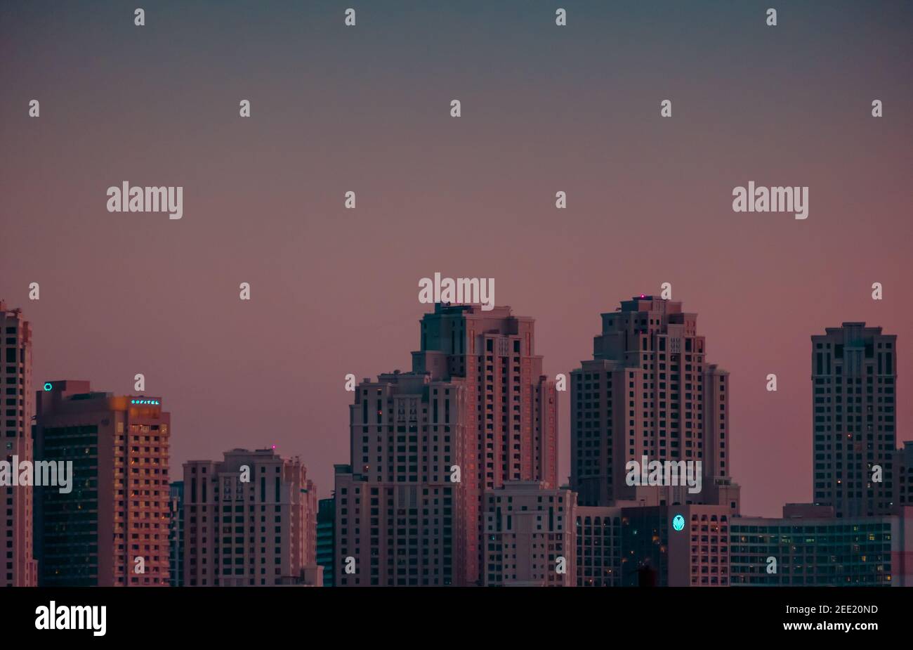 Beautiful shot of tall buildings in Dubai during sunset Stock Photo - Alamy