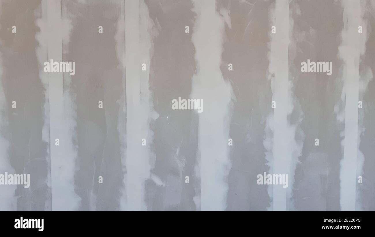 Plasterboard wall filled with plaster filler in residential room in ...