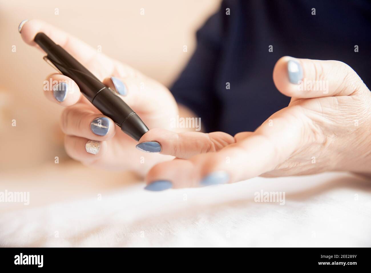 Woman use glucometer for test sugar blood level for diabetes, insulin ...