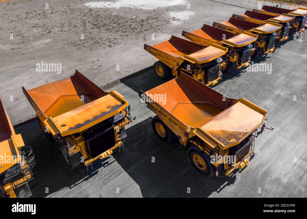 Concept sale of industrial equipment. Parking with big yellow mining ...