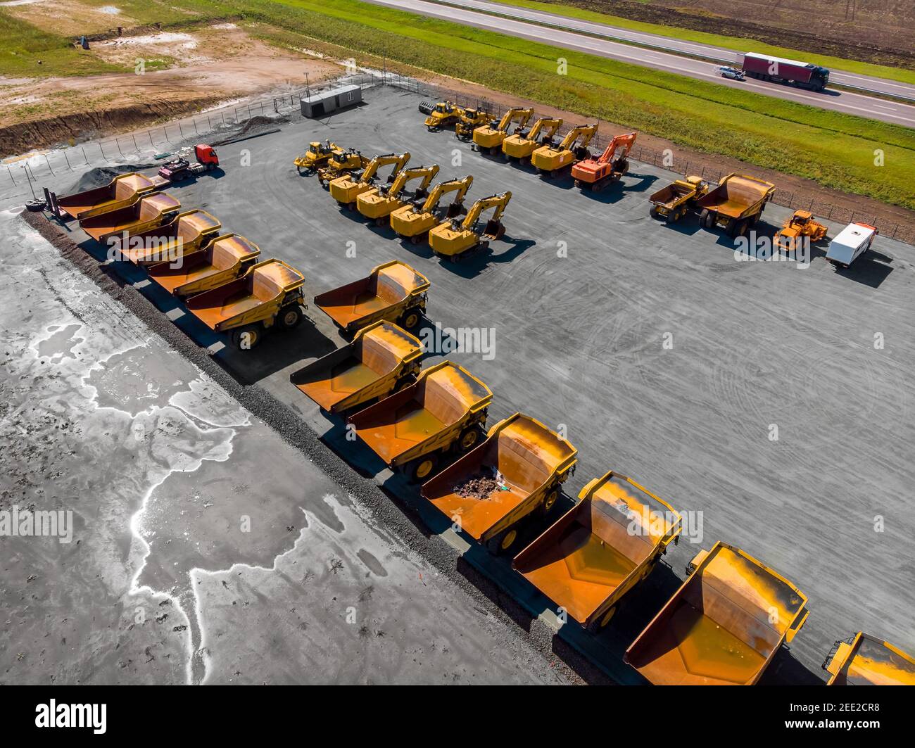 Concept sale of industrial equipment. Parking with big yellow mining ...