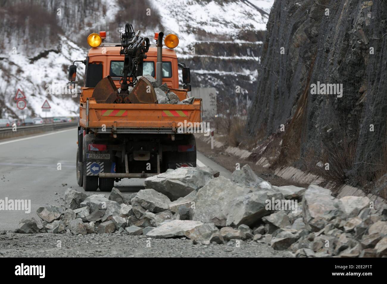 Sofia, Bulgaria - 31 January, 2021: Workers clean the aftermath of a ...
