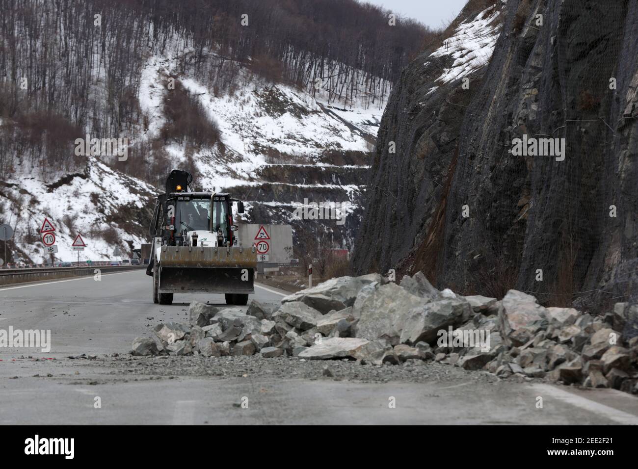 Sofia, Bulgaria - 31 January, 2021: Workers clean the aftermath of a ...