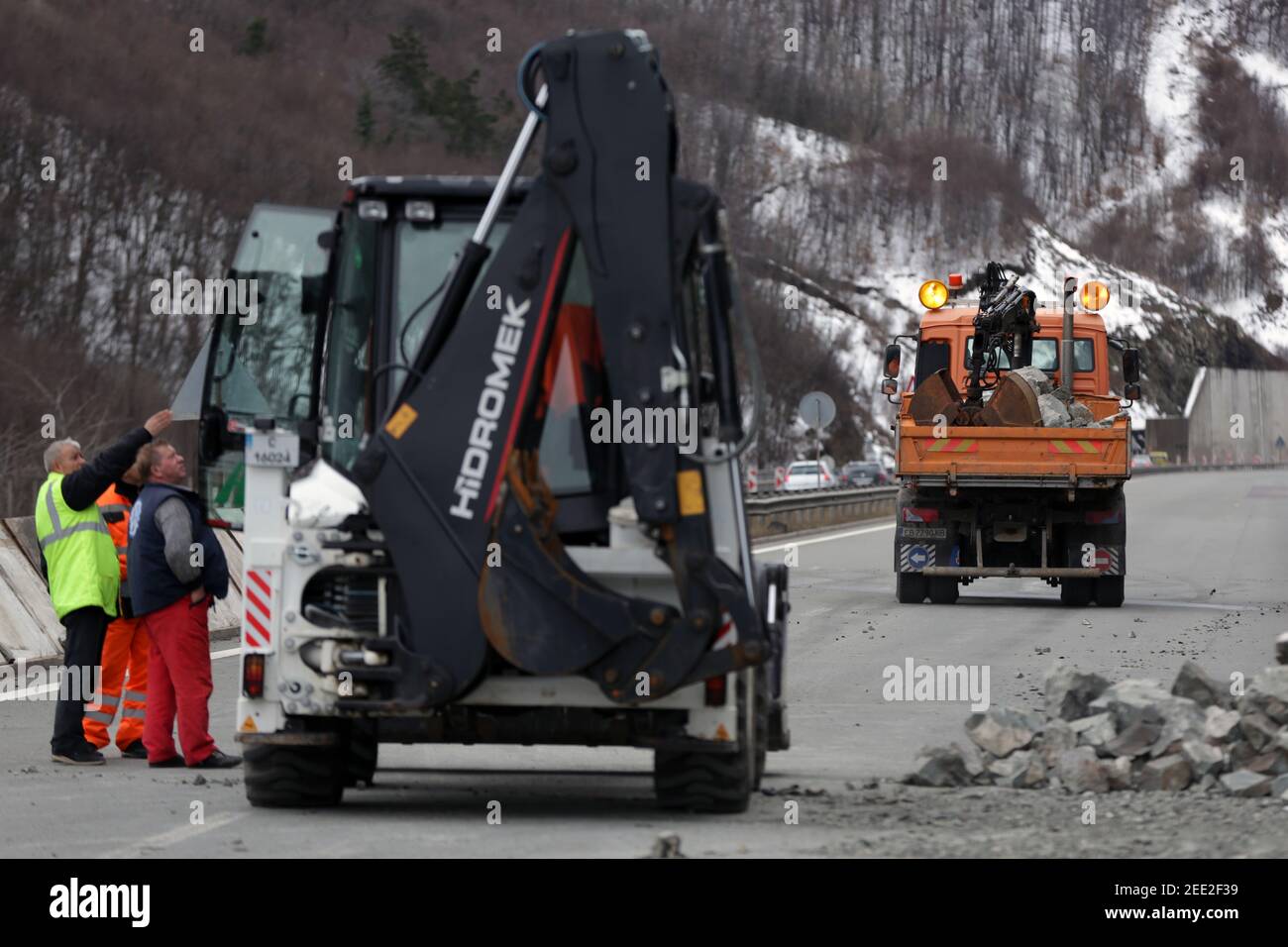 Sofia, Bulgaria - 31 January, 2021: Workers clean the aftermath of a ...