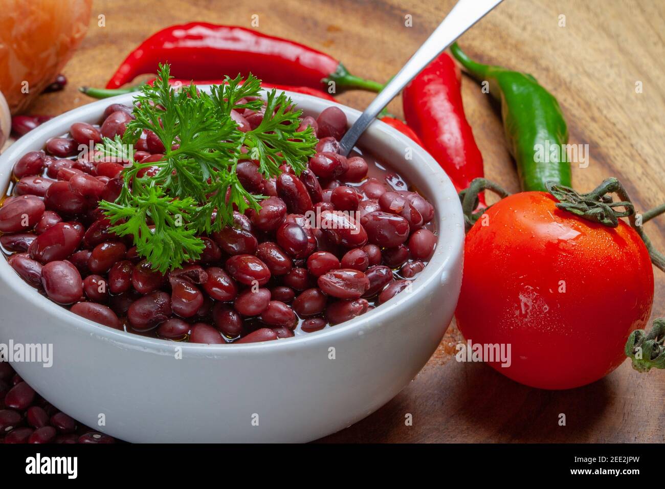 Beans cooked in the bowl Stock Photo - Alamy
