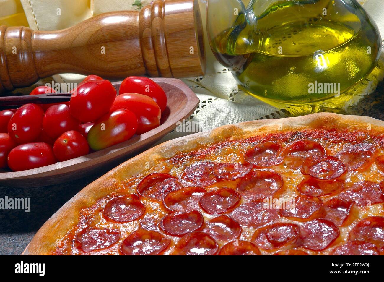 Pizza pepperoni with olive oil Stock Photo - Alamy
