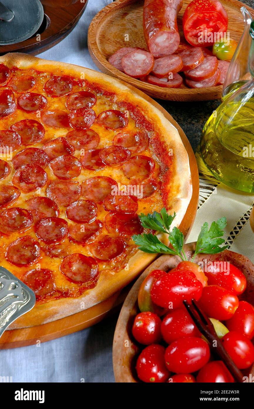 Pizza pepperoni with olive oil Stock Photo - Alamy