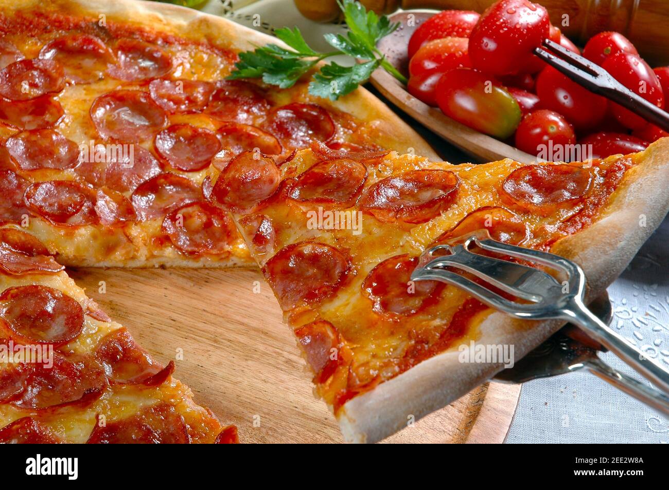 Pizza pepperoni with olive oil Stock Photo - Alamy