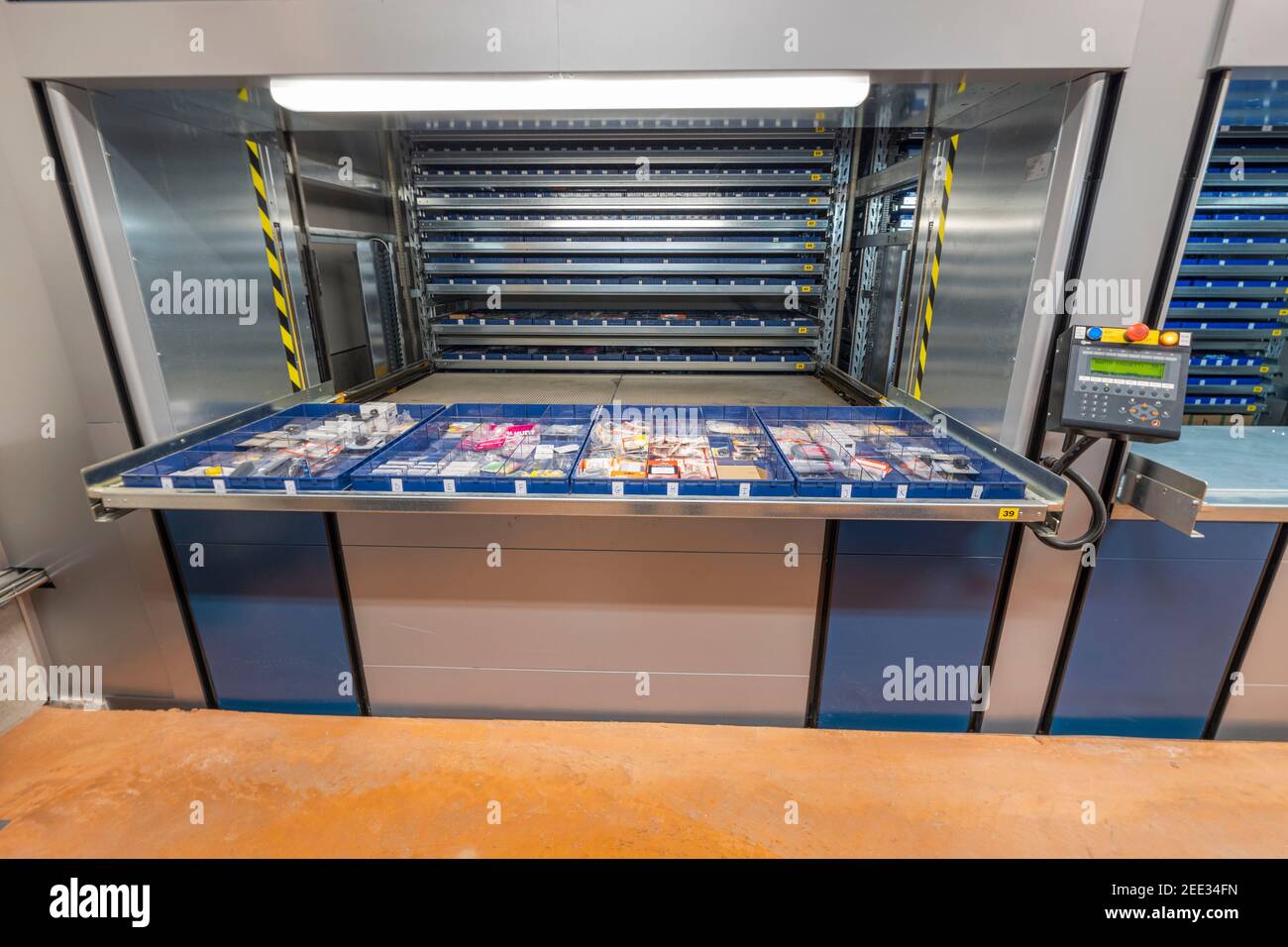 Automated storage system in the warehouse. Vertical carousel storage ...