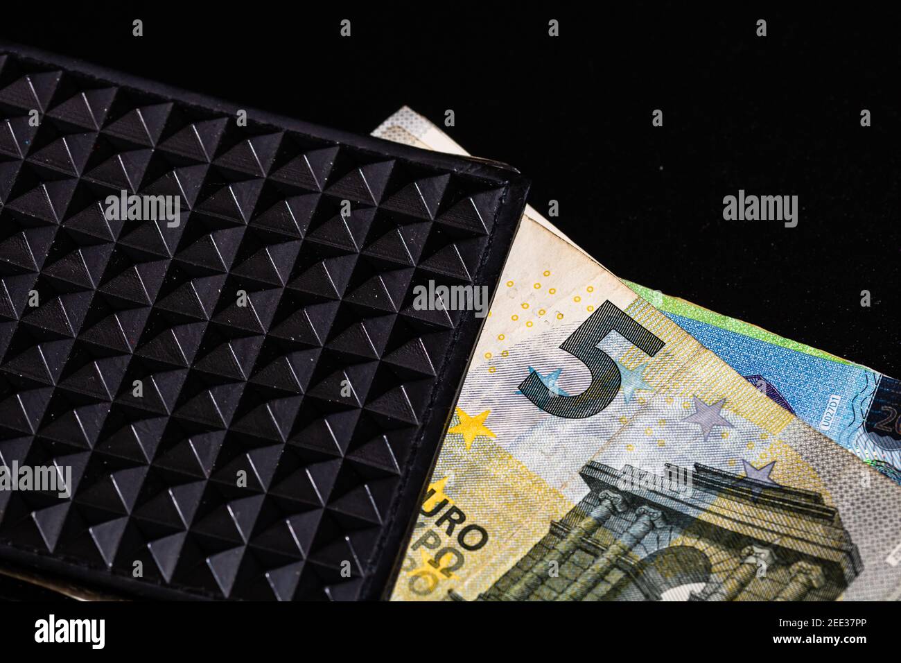 5 Euro money banknotes in black wallet isolated Stock Photo - Alamy