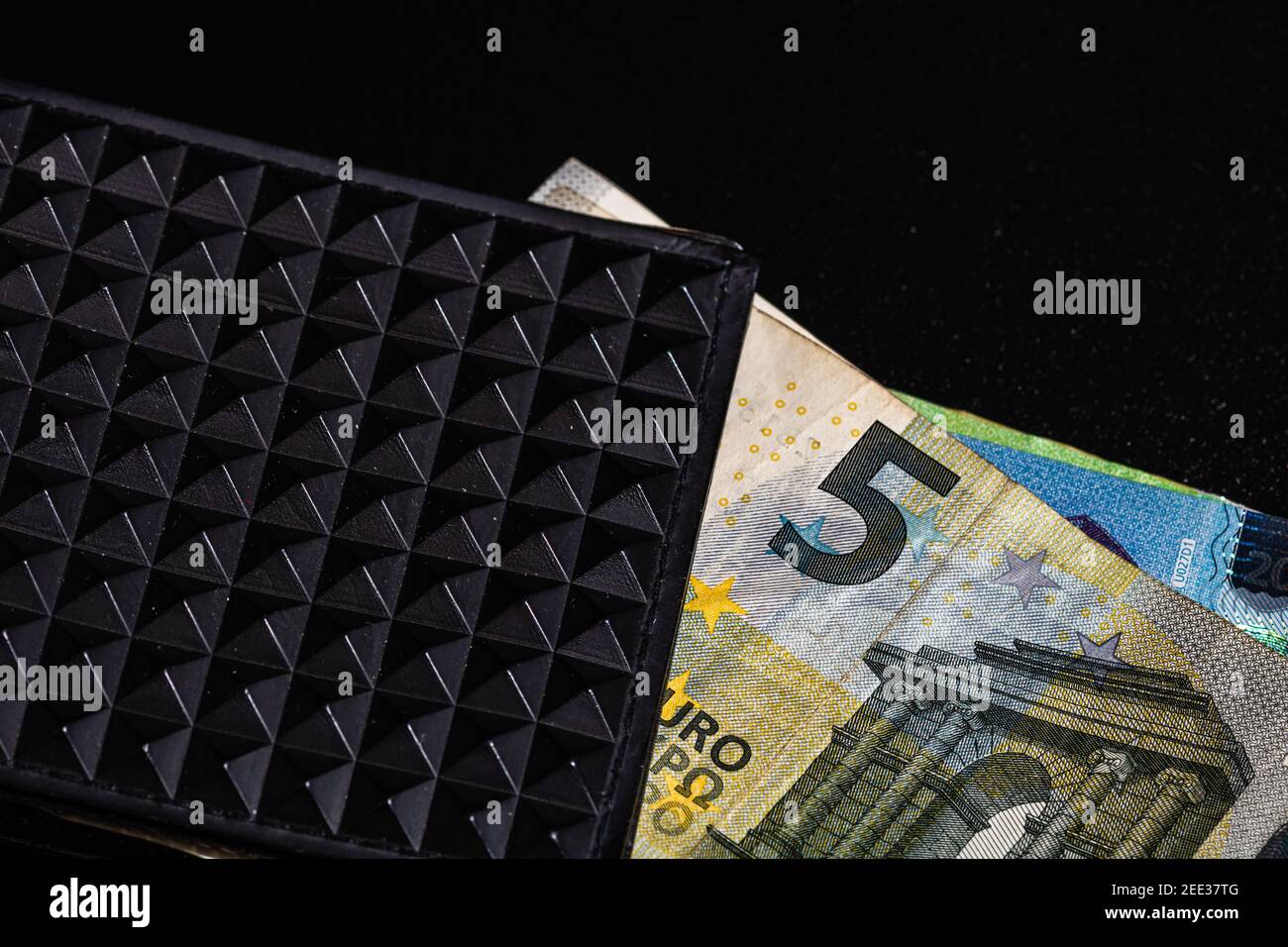 5 Euro money banknotes in black wallet isolated Stock Photo - Alamy