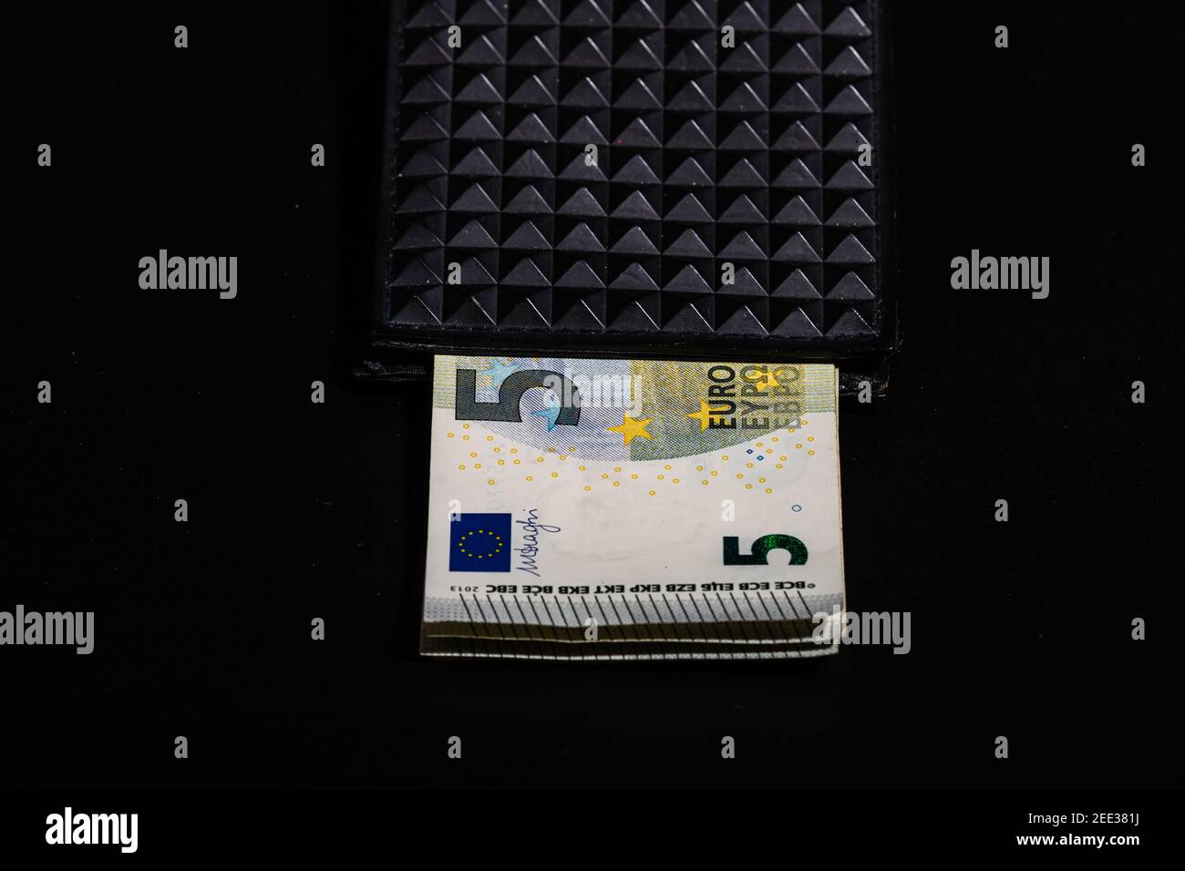 5 Euro money banknotes in black wallet isolated Stock Photo - Alamy
