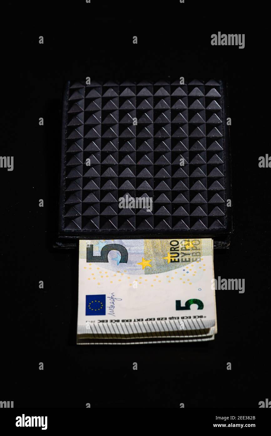 5 Euro money banknotes in black wallet isolated Stock Photo - Alamy