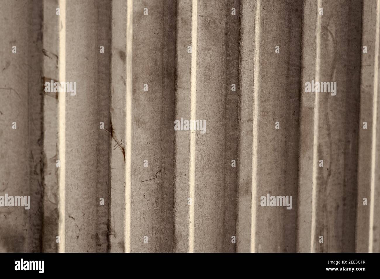 Abstract grey cement wall architectural structure with textured surface ...