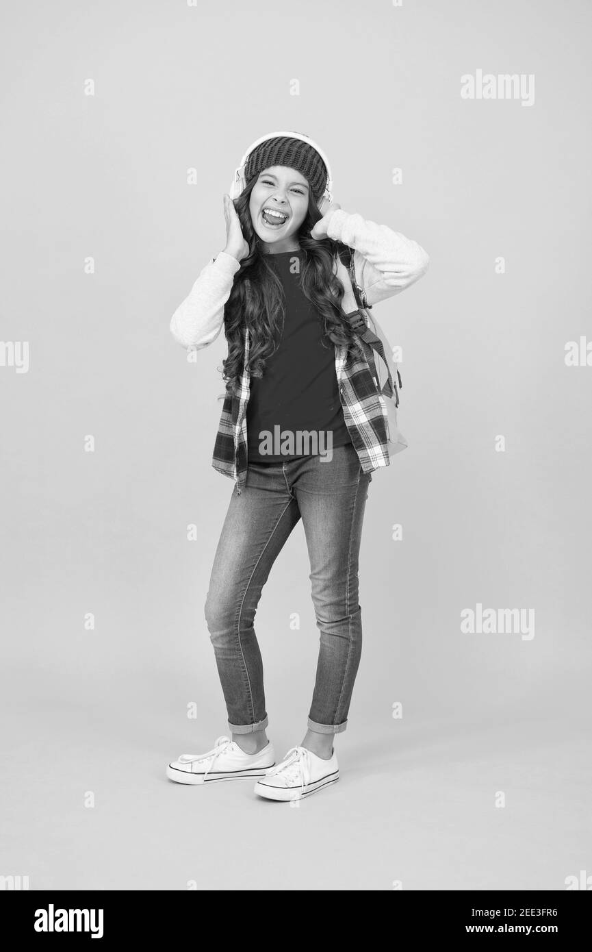 Technology in promoting singing. Happy kid sing to music playing in ...