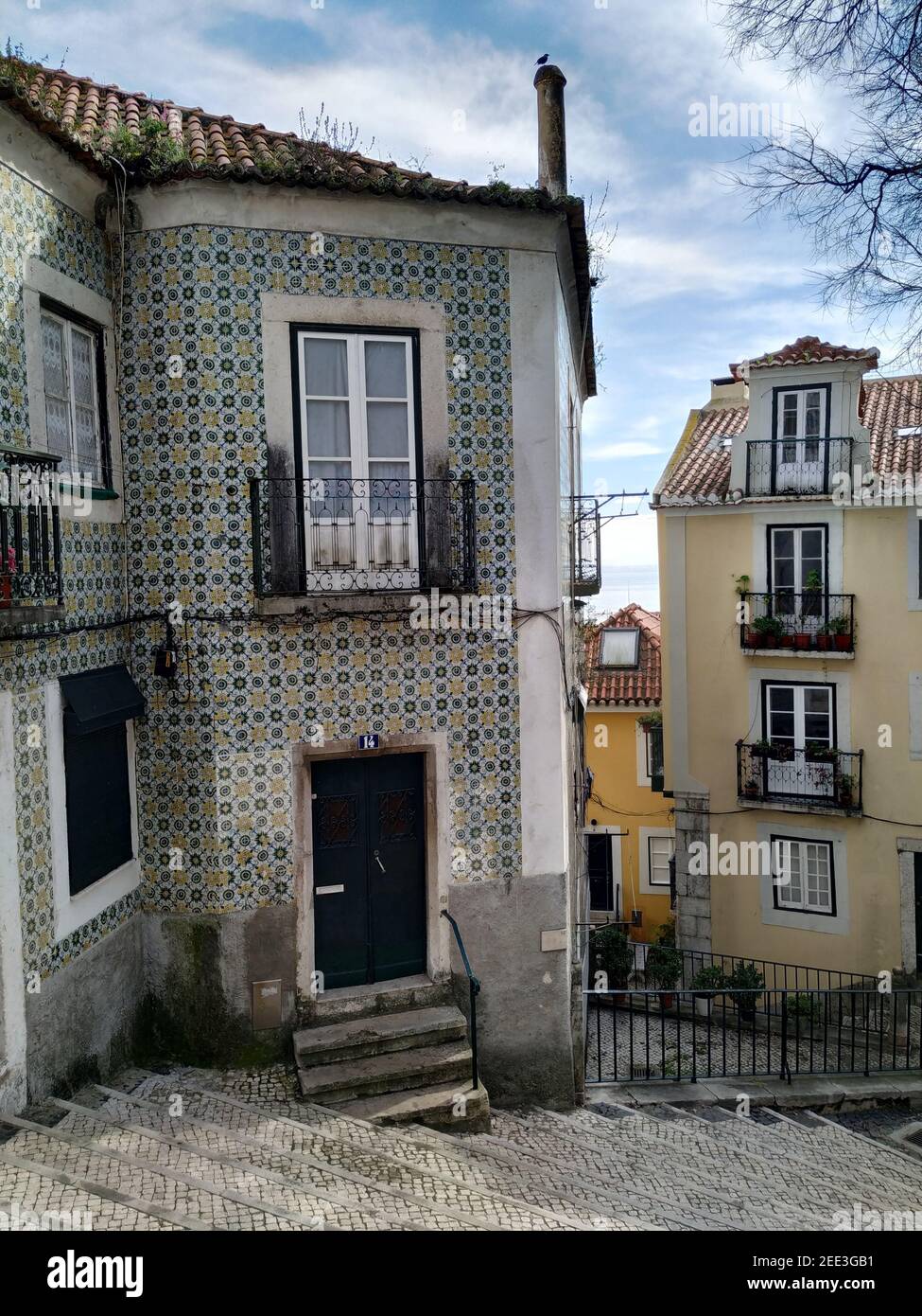 Vertical shot of old beautiful buildings with a stairway Stock Photo ...