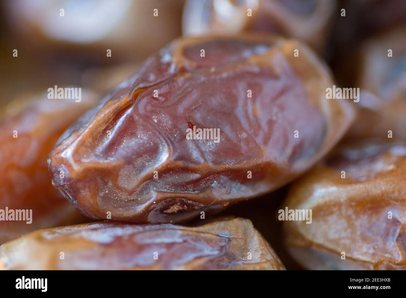 Close up view of dried Medjool dates (fruits of the date palm) piled up ...