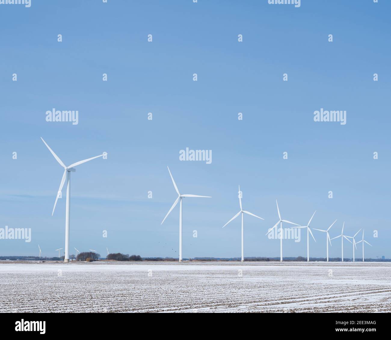 Wind turbines in snowy rural landscape hi-res stock photography and ...