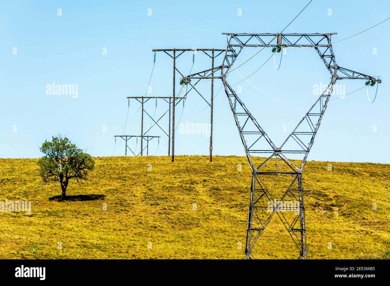 Closeup shot of electric poles for high voltage in Auvergne-Rhone-Alpes ...