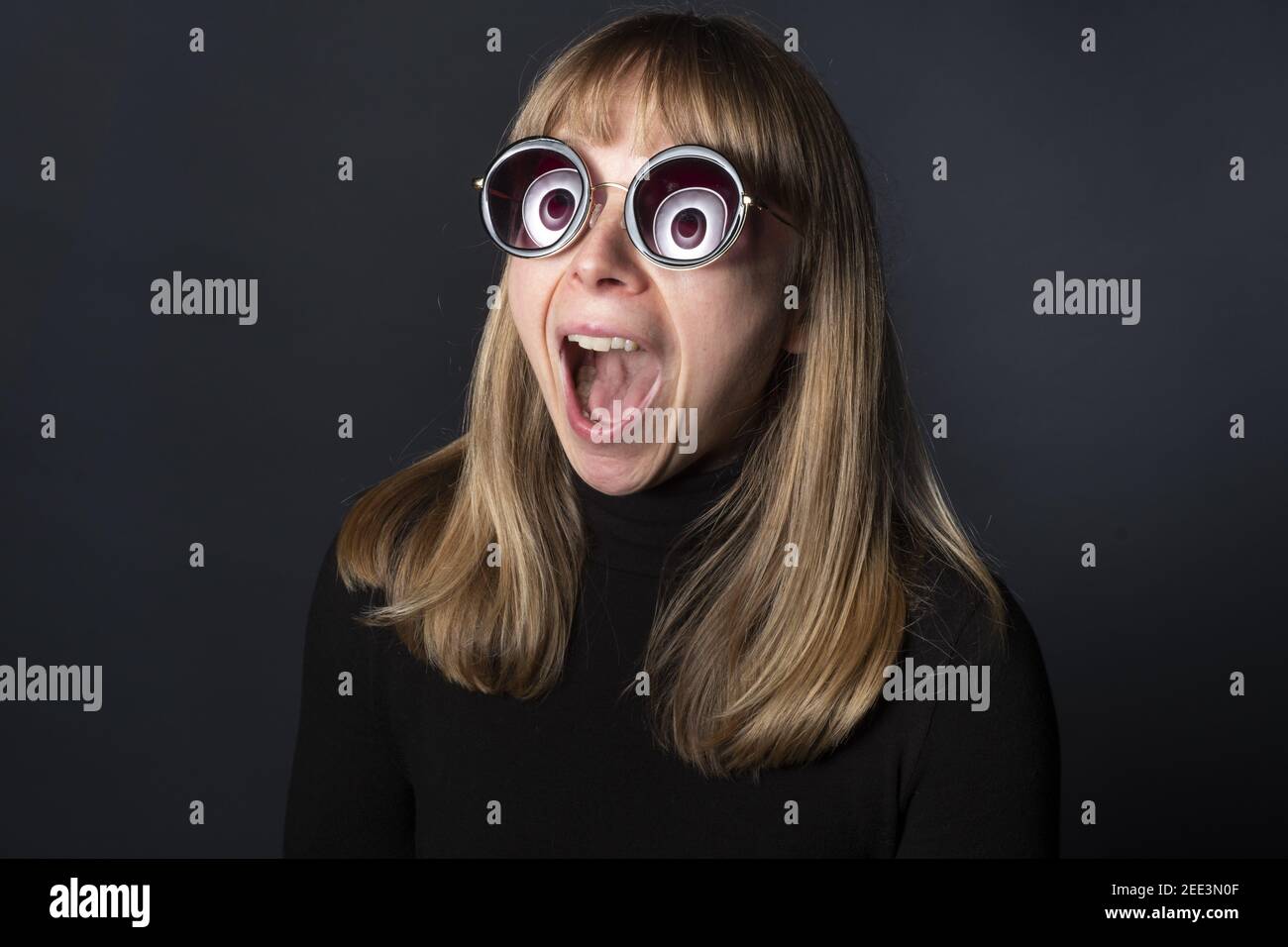 Surprised female nerd in hi-res stock photography and images - Alamy