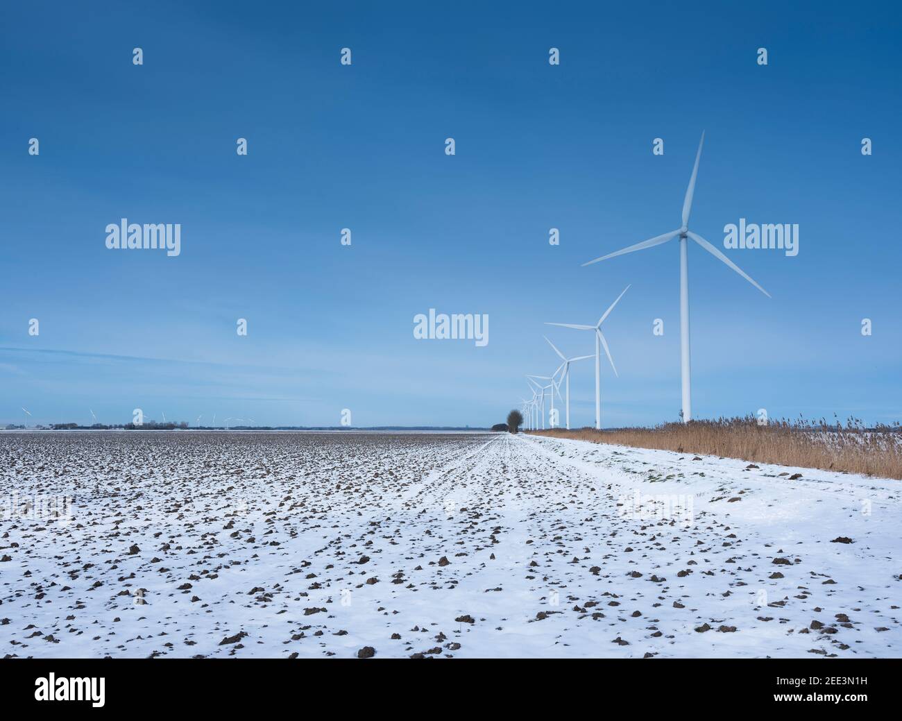 Wind turbines in snowy rural landscape hi-res stock photography and ...