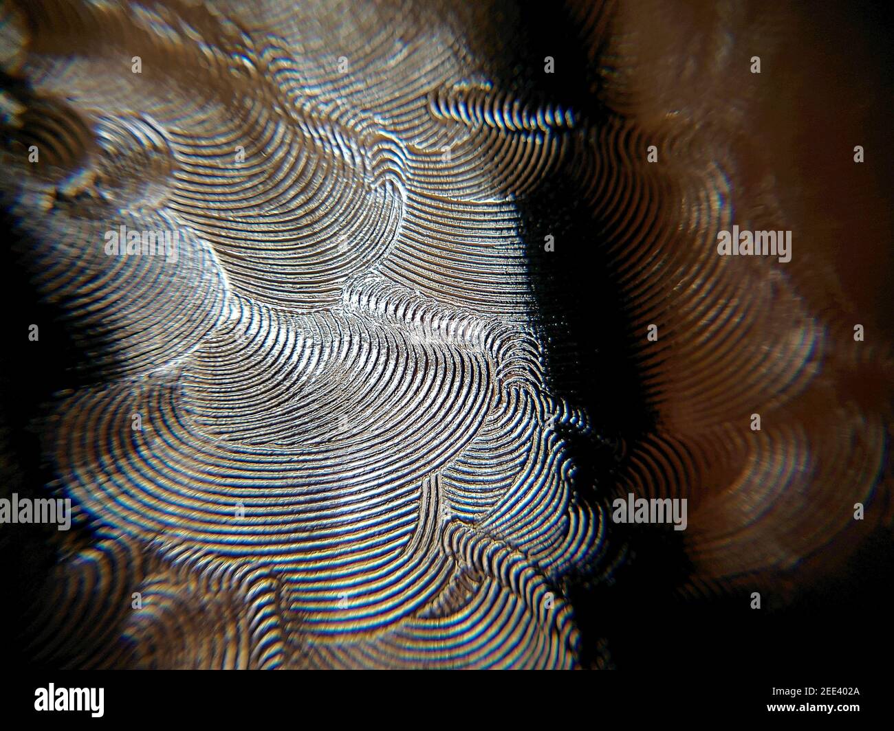 Light patterns creating light and shadows on a plastic film on the door ...