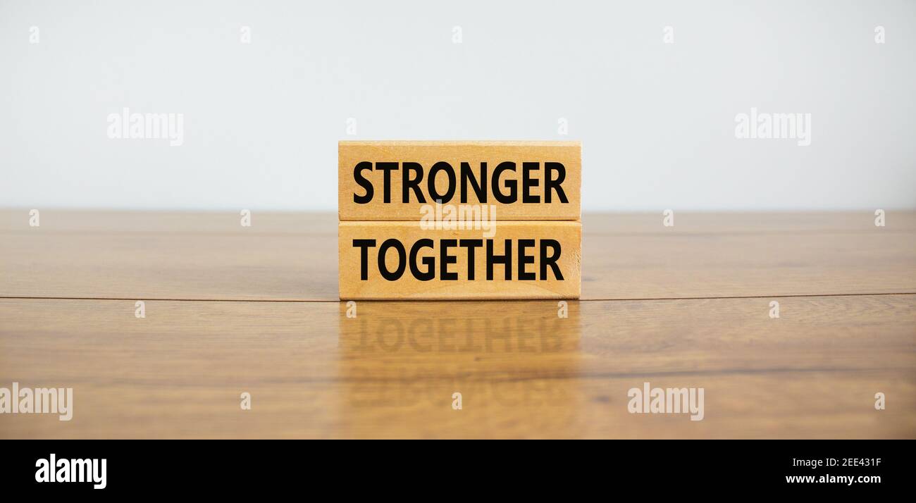 Stronger together symbol. Concept words 'stronger together' on wooden ...