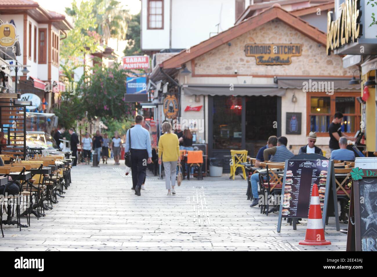 Narrow street of Turkish town with outdoor cafes Stock Photo - Alamy