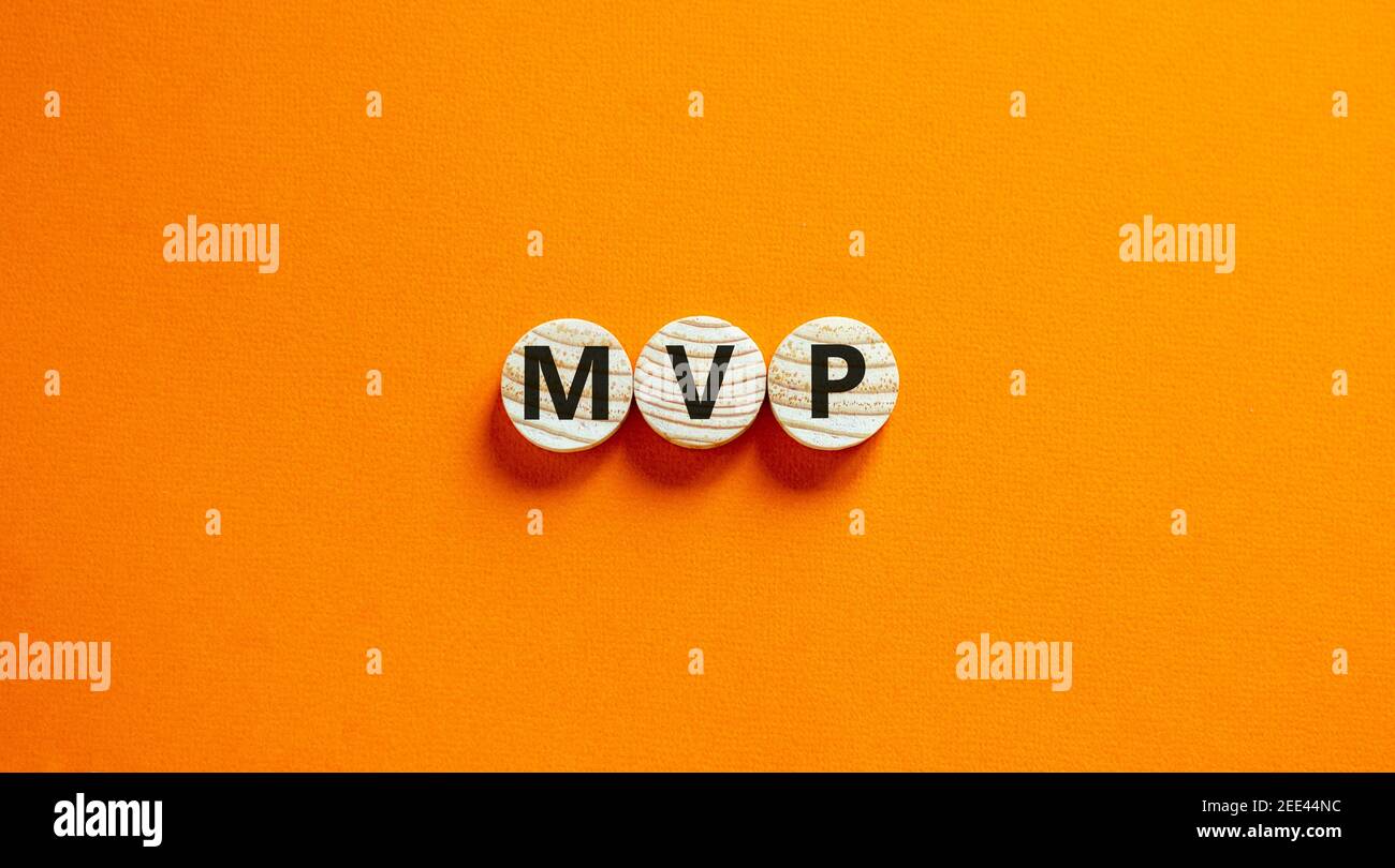 MVP, minimum viable product symbol. Wooden circles with the word MVP ...