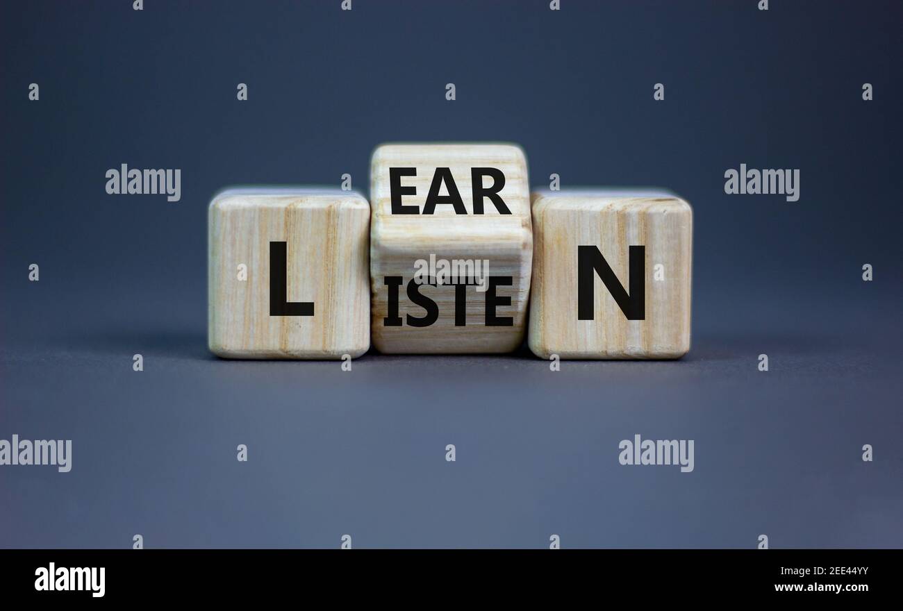 Listen and learn symbol. Turned a wooden cube and changed the word ...
