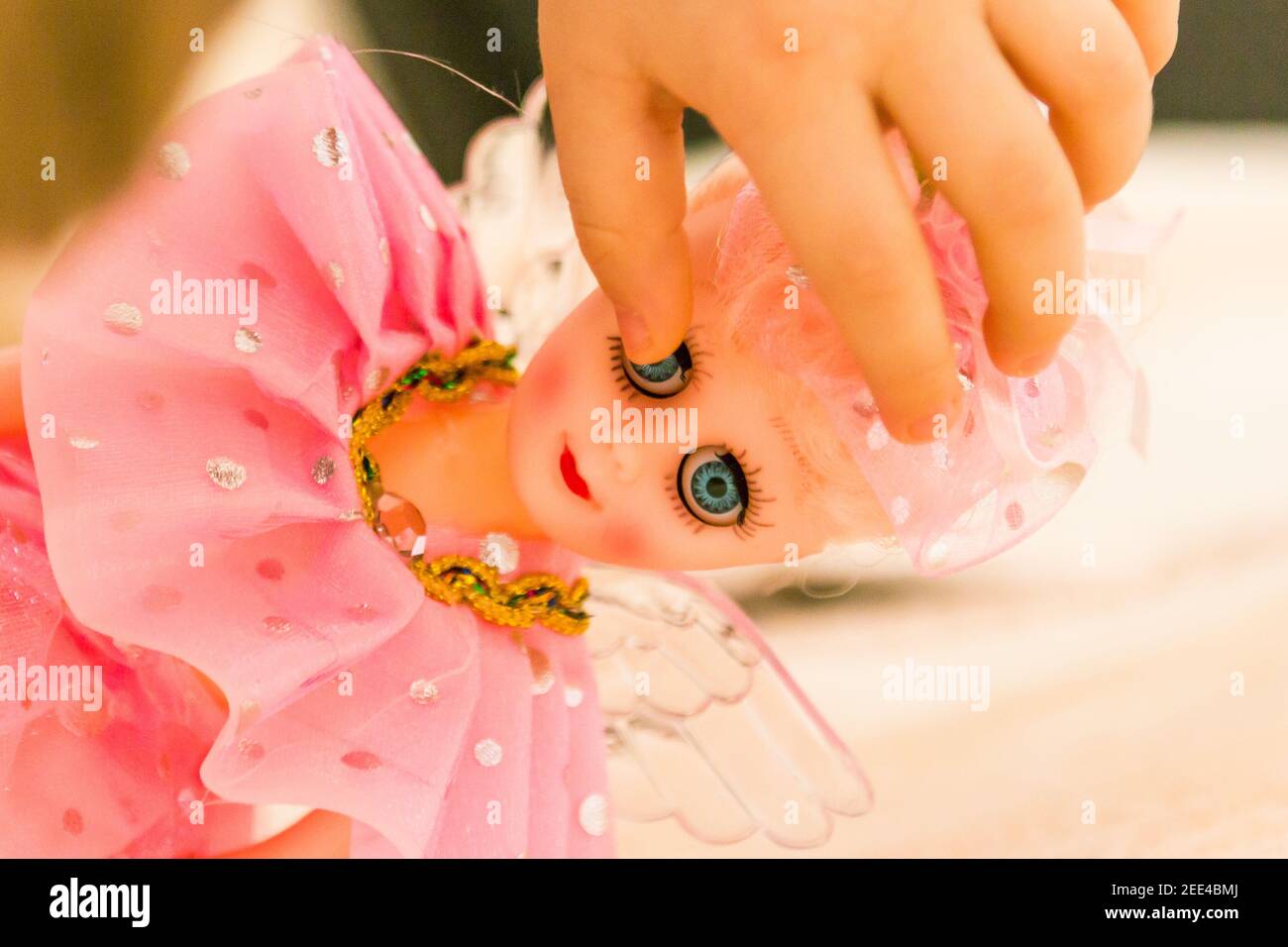 Child grabbing toy hi-res stock photography and images - Alamy