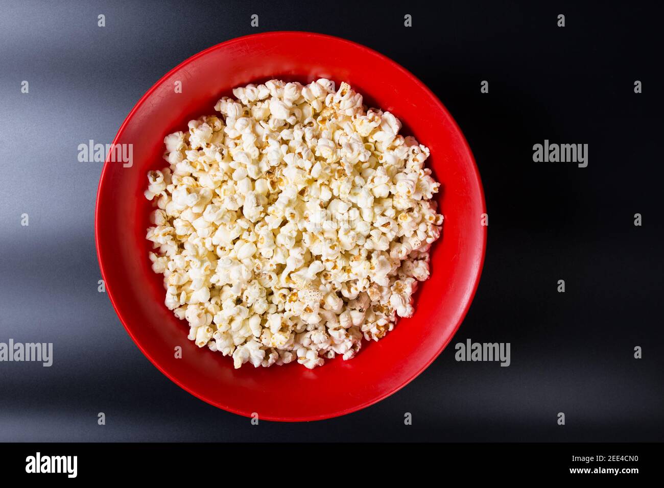 Large popcorn in red hi-res stock photography and images - Alamy