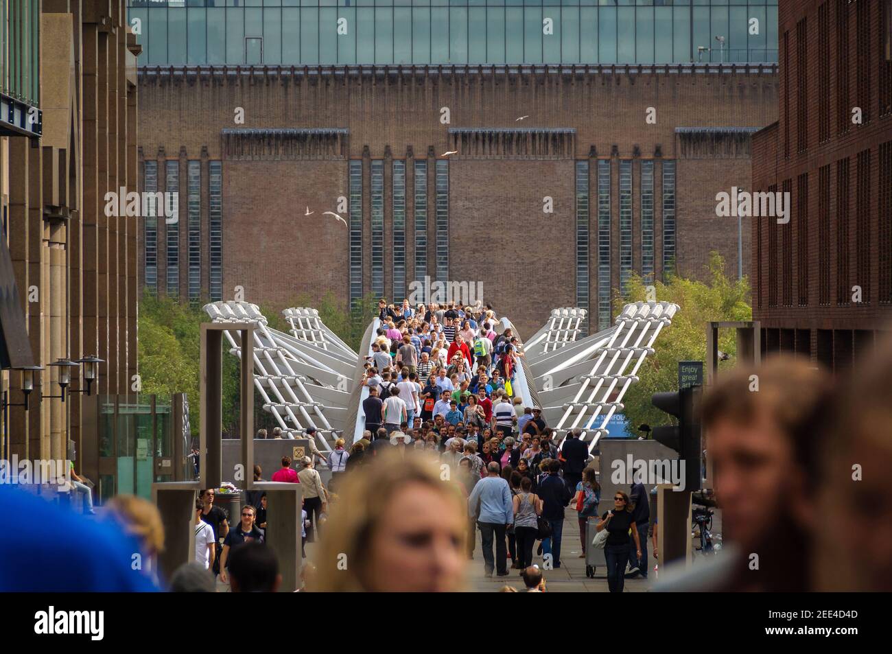People on the Millennium Bridge. The Millennium Bridge is a steel ...
