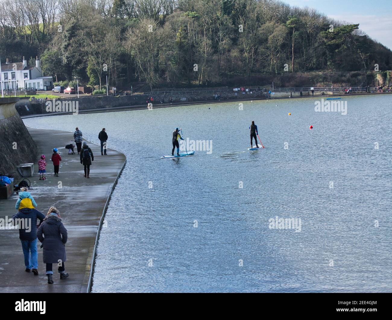 People swimming on paddle board in Clevedon, UK Stock Photo - Alamy
