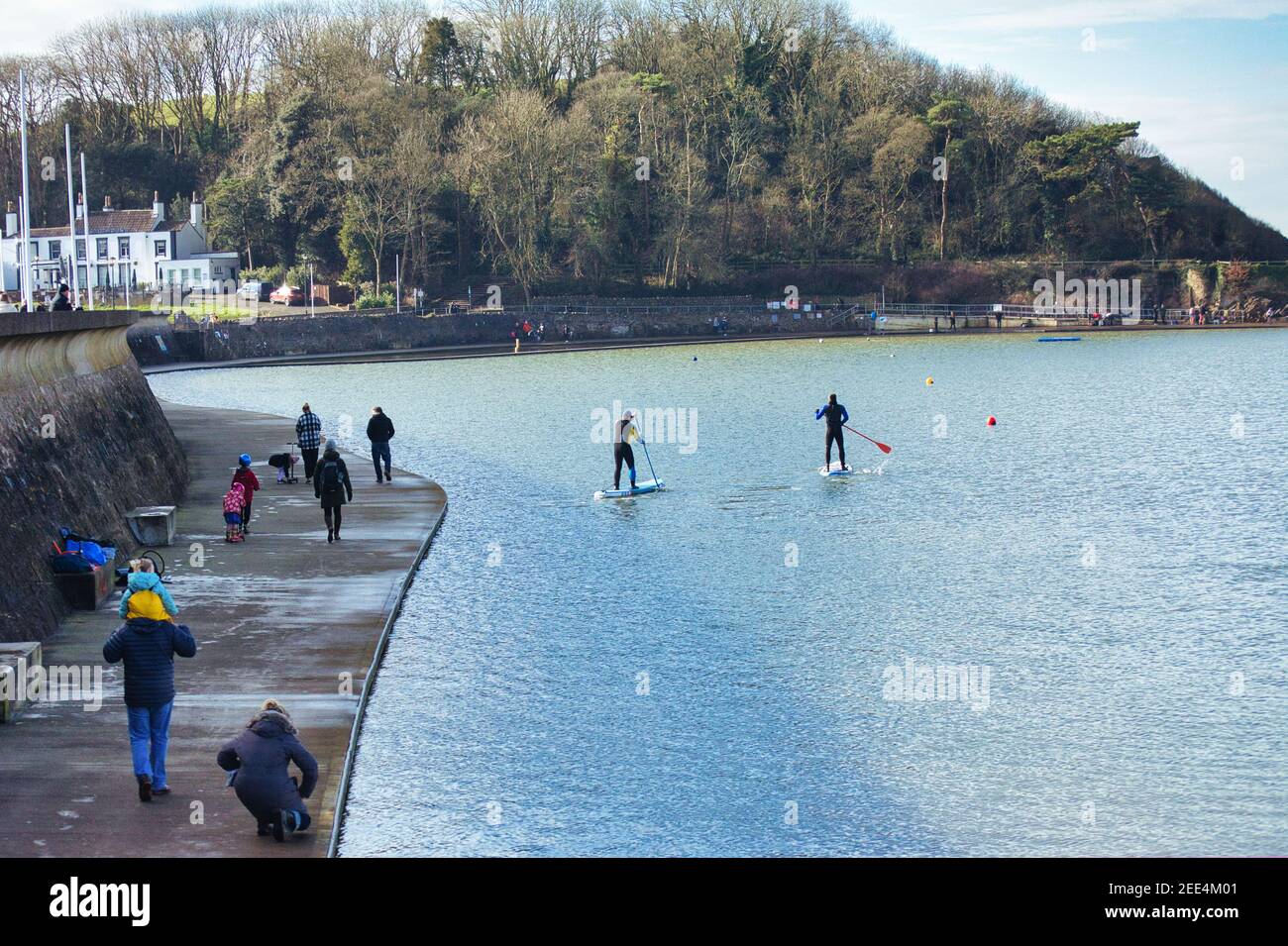 People swimming on paddle board in Clevedon, UK Stock Photo - Alamy