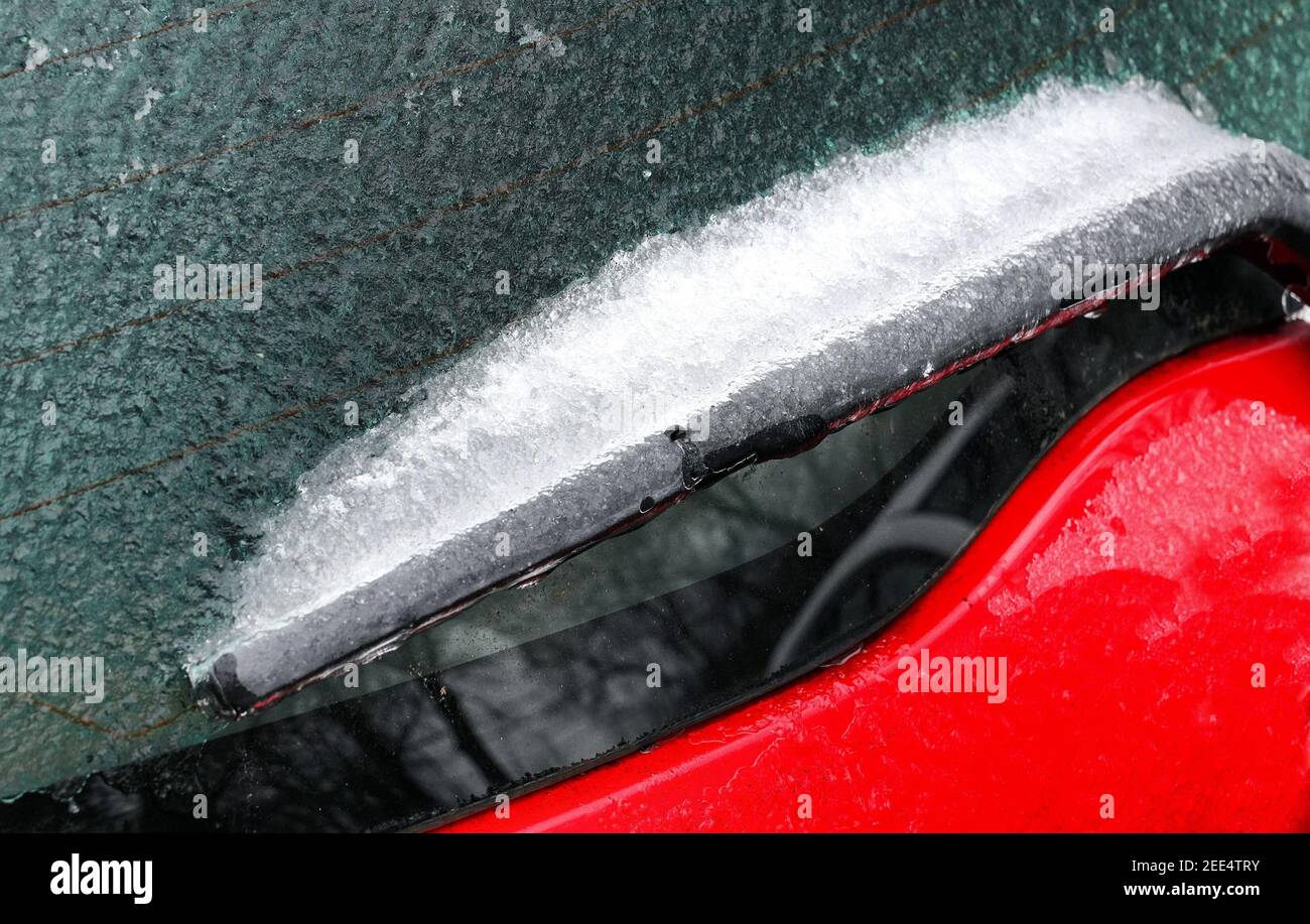 rear window of a red car after an ice storm Stock Photo - Alamy