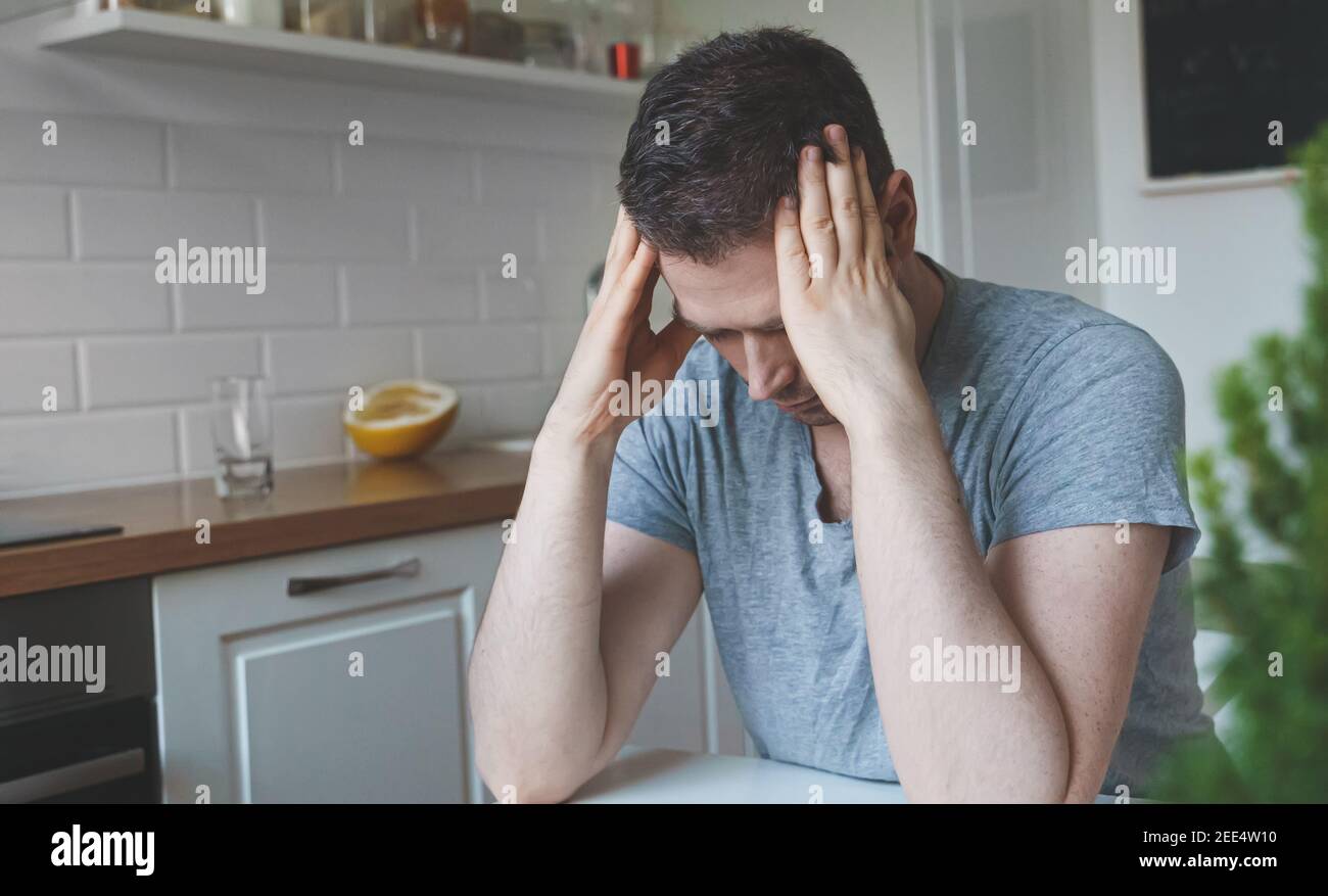 Man headache kitchen hi-res stock photography and images - Alamy