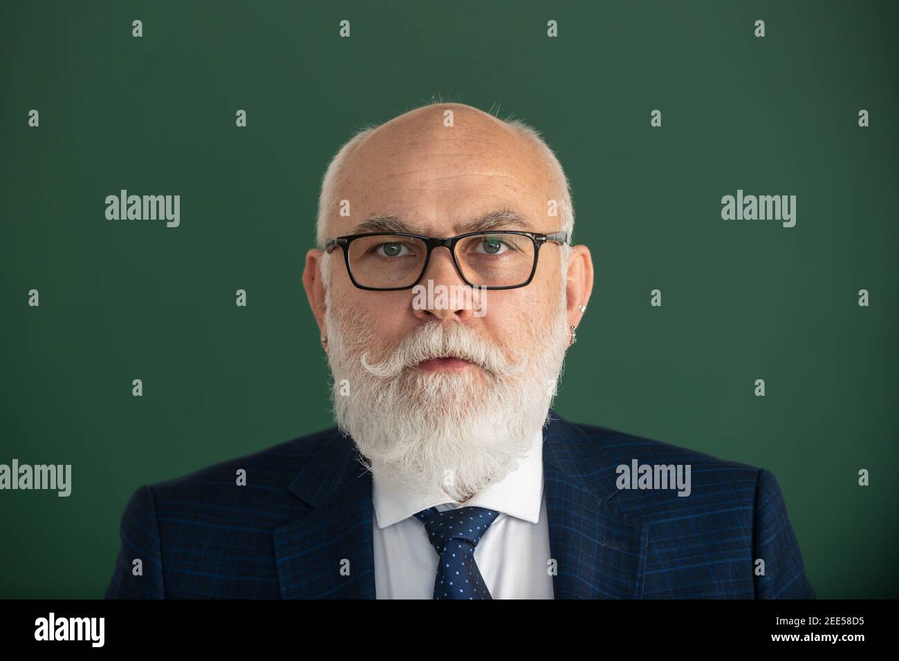 Closeup portrait of old male professor. Portrait of man with copy space ...