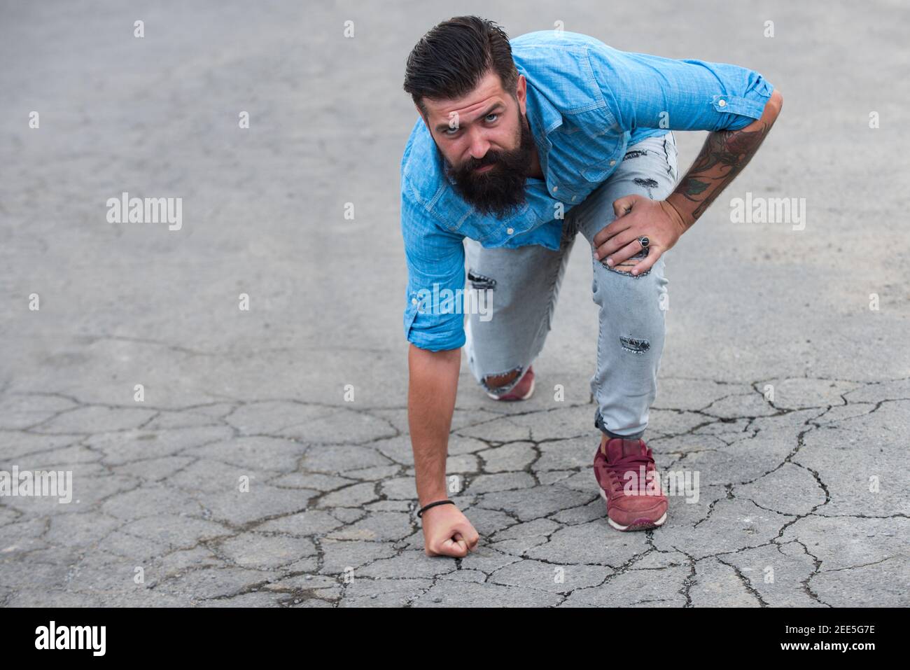 Leadership concept. Man power. Superman fist cracked ground. Male ...