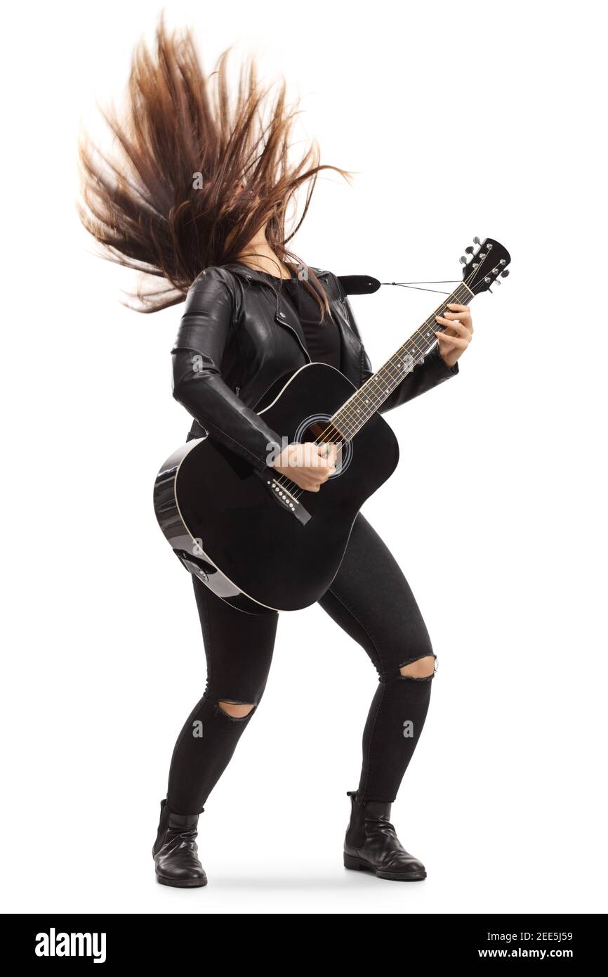 Rock girl playing a guitar and waving hair isolated on white background ...
