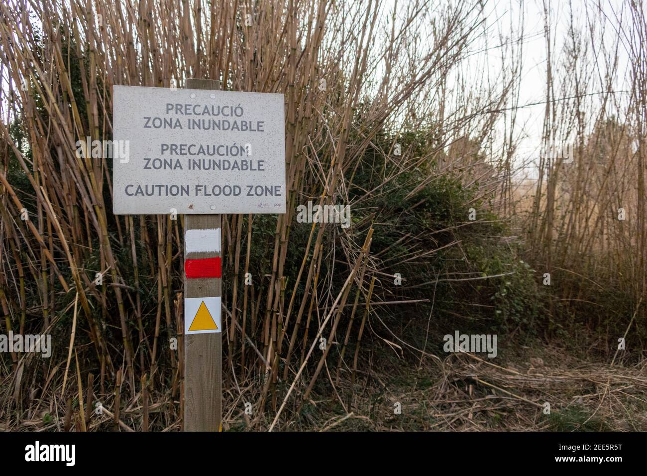 "CAUTION FLOOD ZONE" sign in the wilderness Stock Photo - Alamy