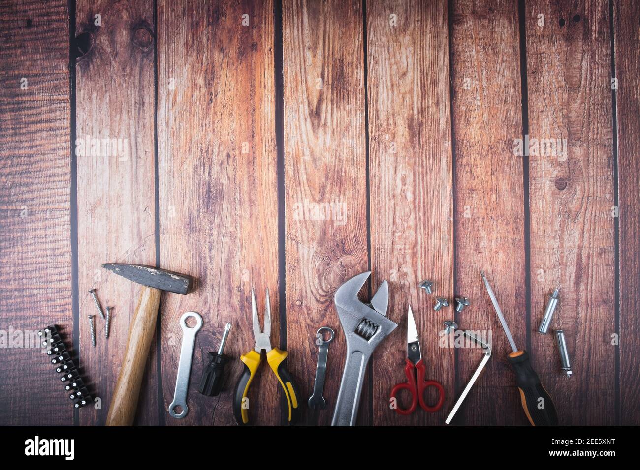working tools on dark wood background with space for text Stock Photo ...
